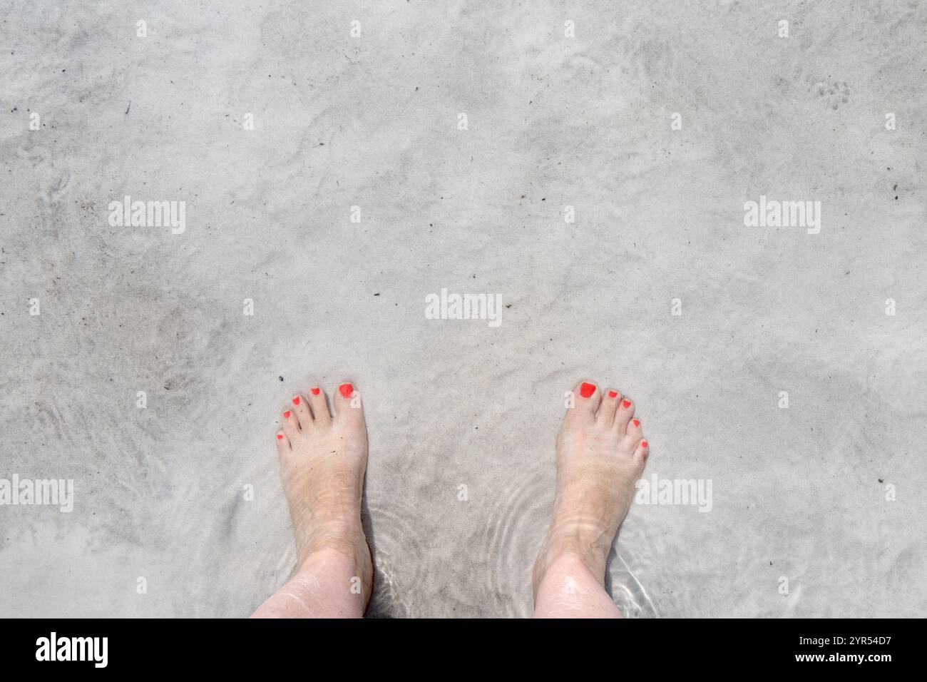 Lake McKenzie, K'gari Fraser Island, feet barefoot standing on sandy ...