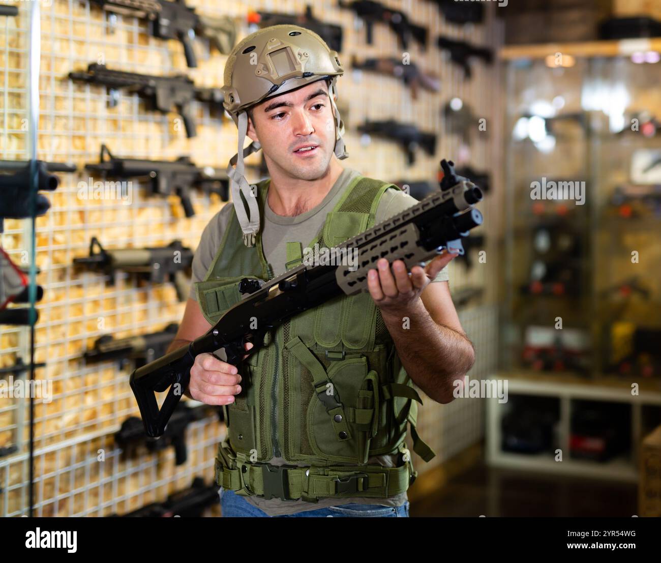 Man selecting machine gun hi-res stock photography and images - Alamy