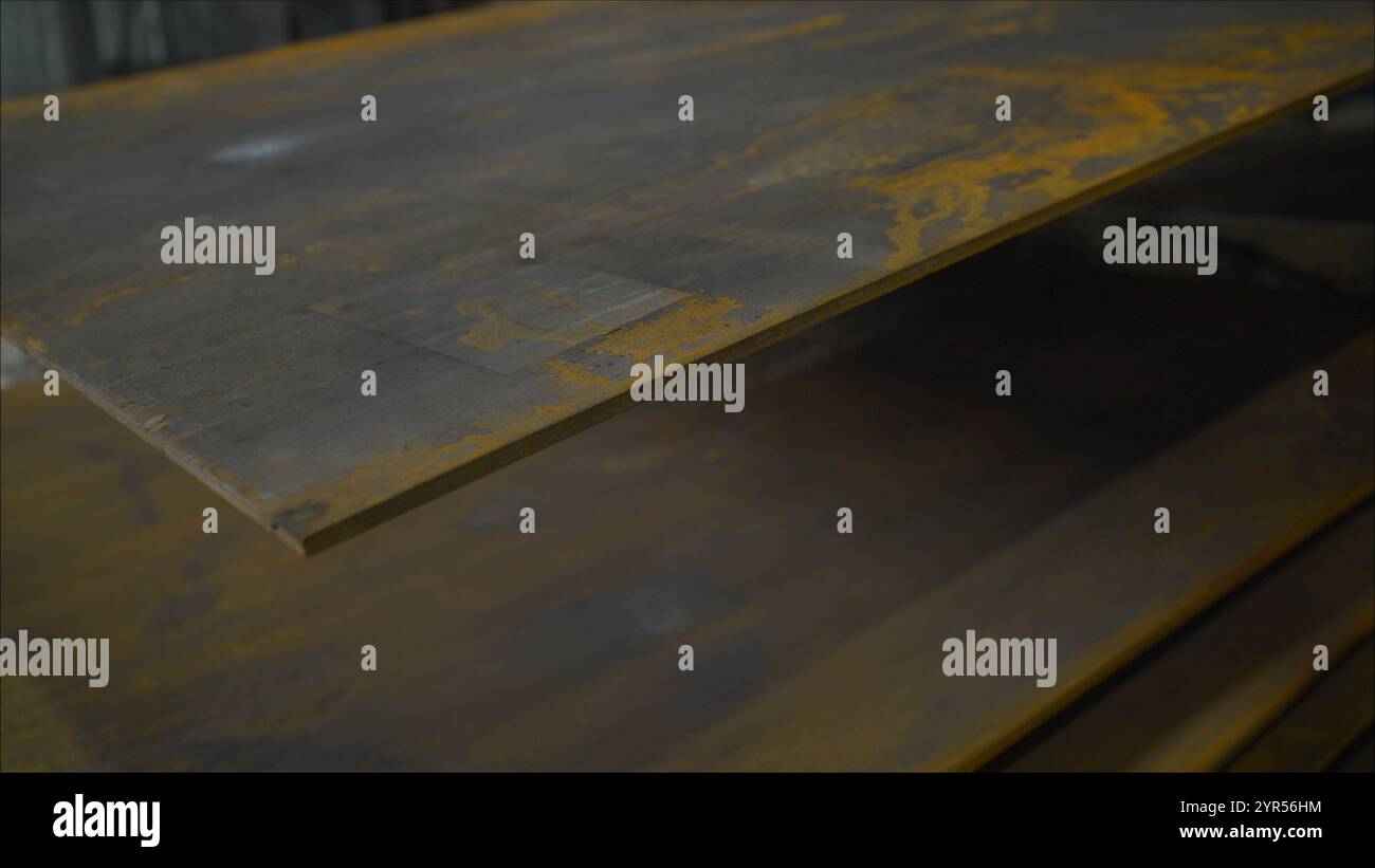Heavy industry. Steel sheets are stacked. Thick steel sheets are at the ...