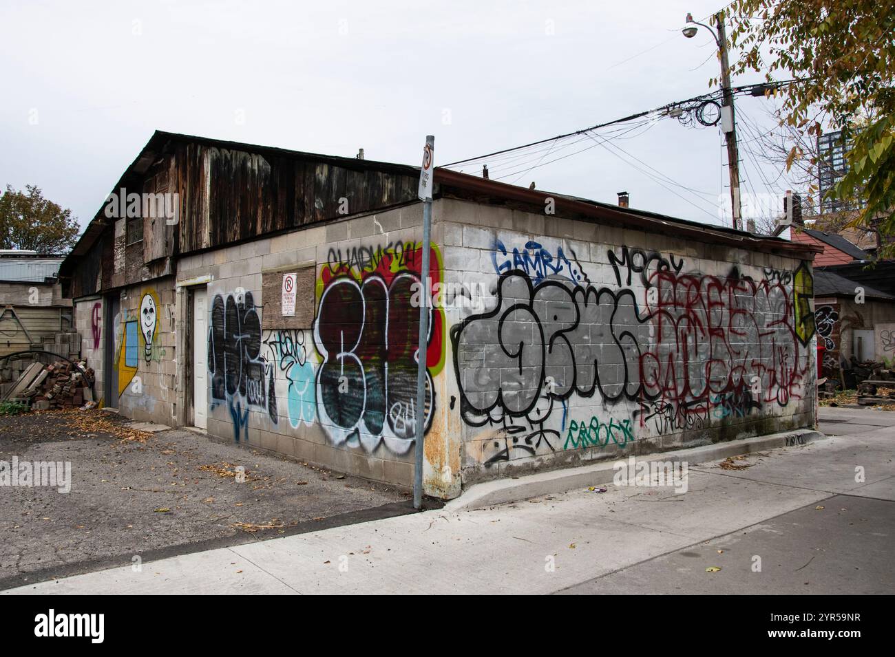 Graffiti tagged on an outbuilding on McCaul Street in downtown Toronto ...