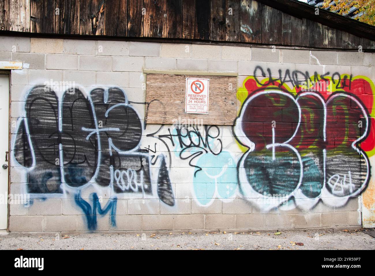 Graffiti tagged on an outbuilding on McCaul Street in downtown Toronto ...