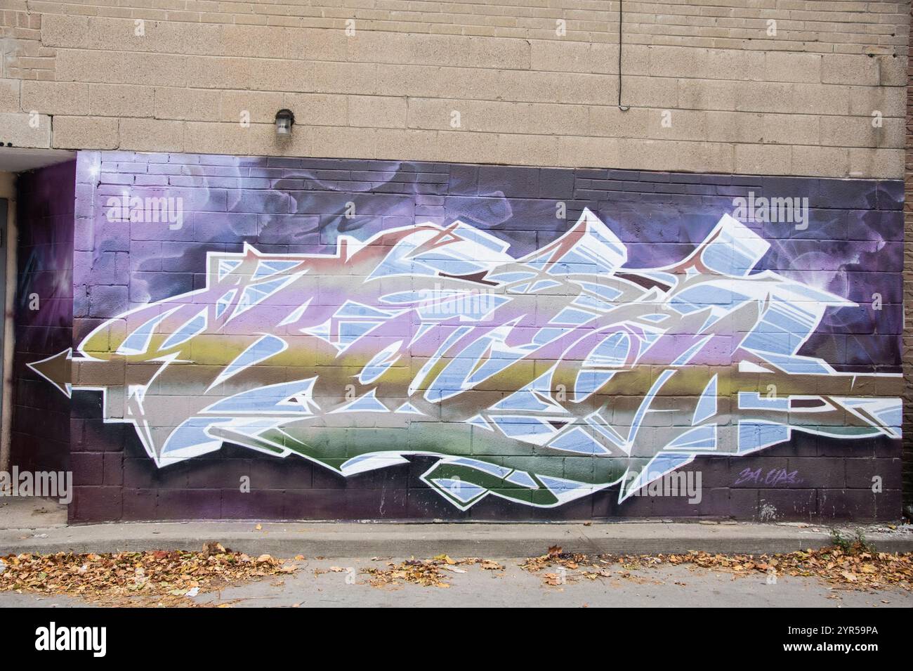 Word bacon with arrow pointing mural on McCaul Street in downtown ...