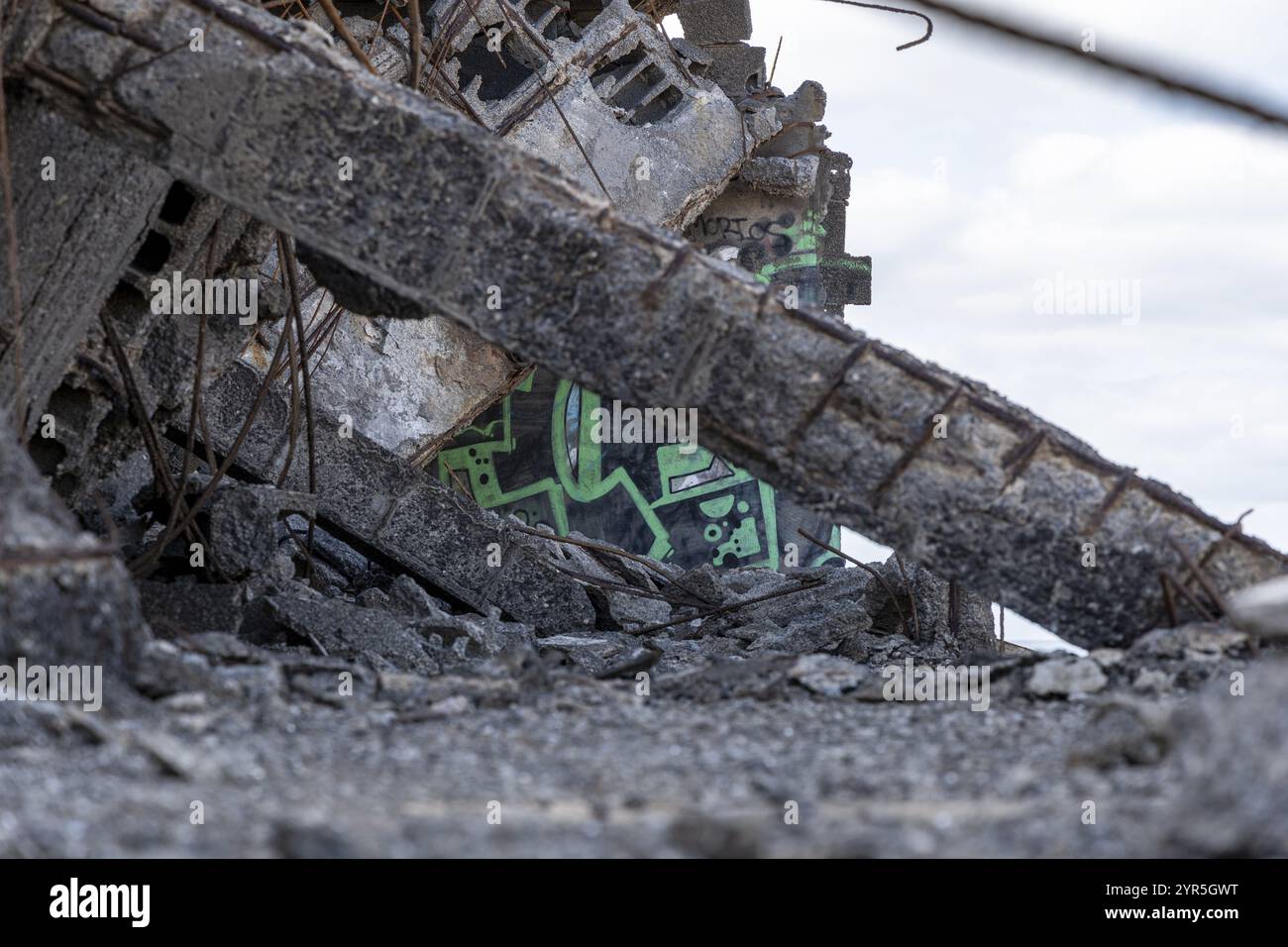 Lost Place, Crumbling concrete structure with graffiti surrounded by ...