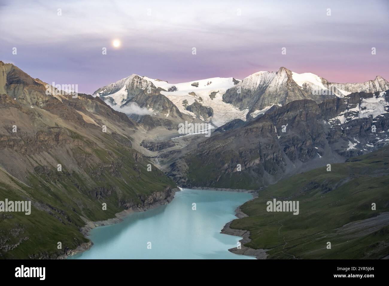 Mountain landscape with turquoise blue reservoir Lac des Dix and summit ...