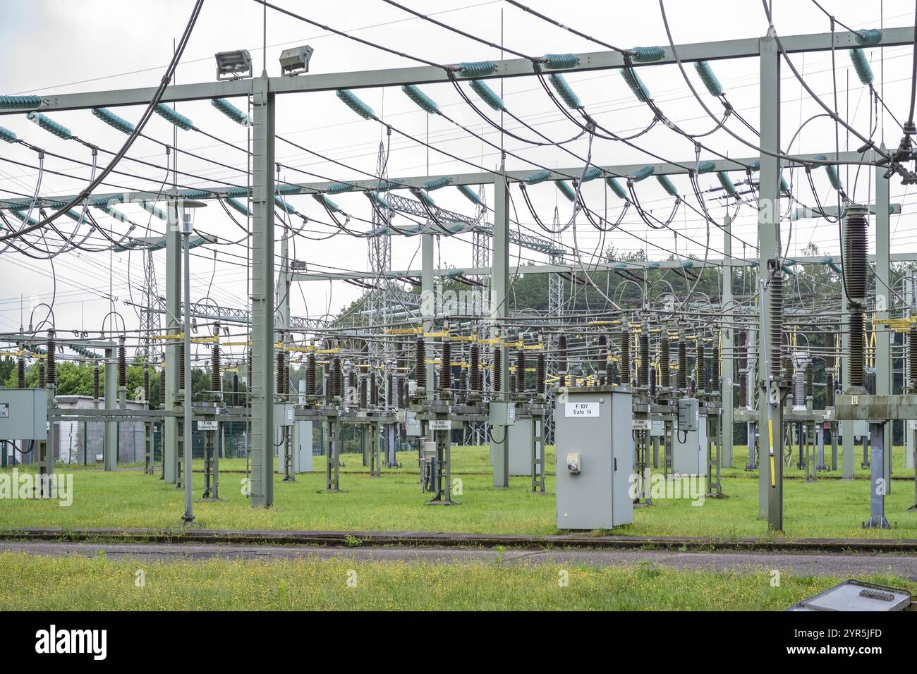 Electrical power plant with meadow Stock Photo - Alamy