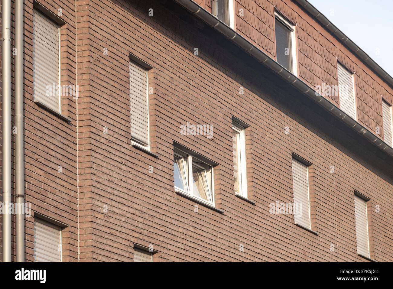 Facade of an modern large house, wall with windows Stock Photo - Alamy