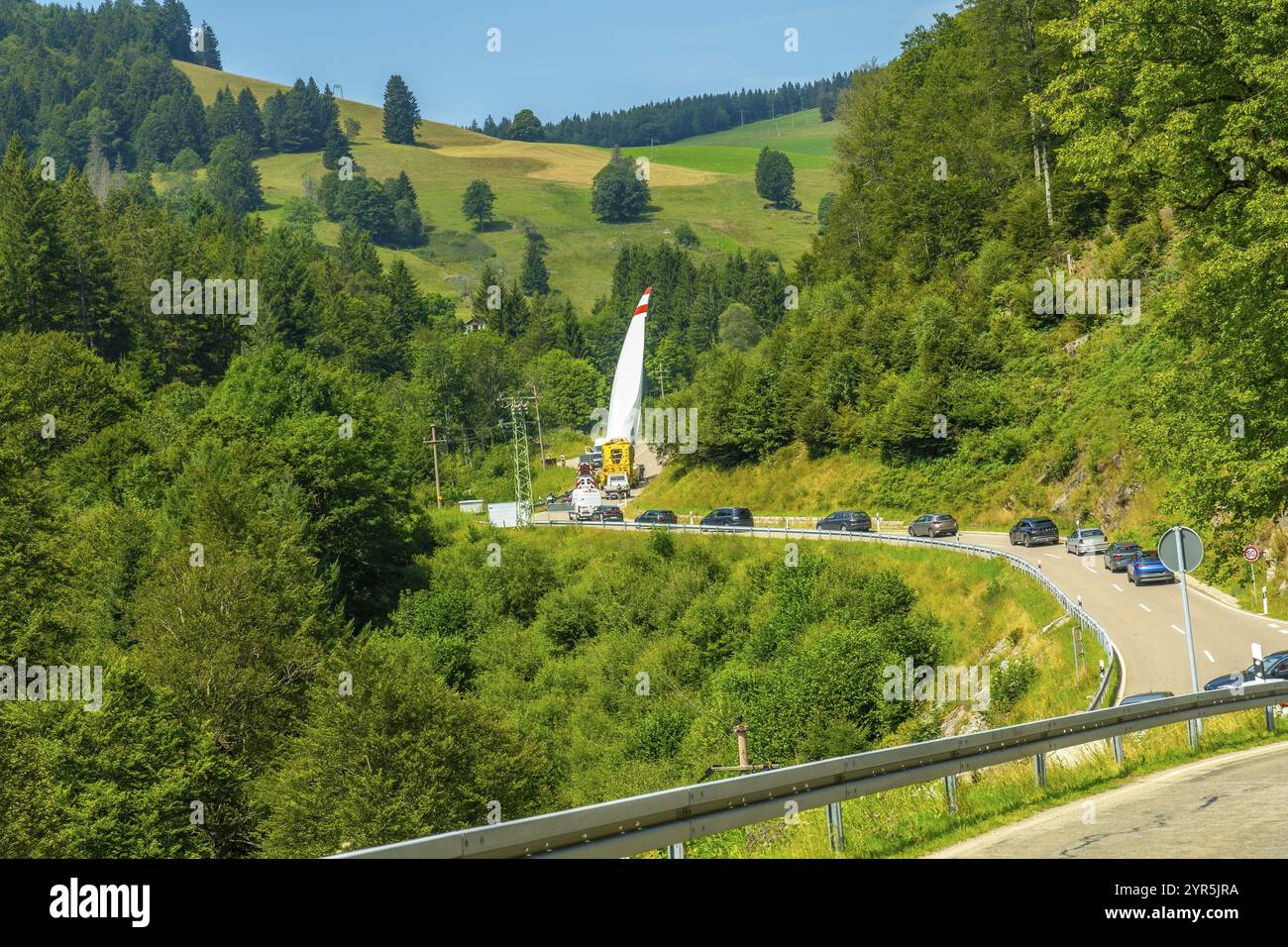 Heavy traffic on the mountain due to transporting wind turbine blades ...