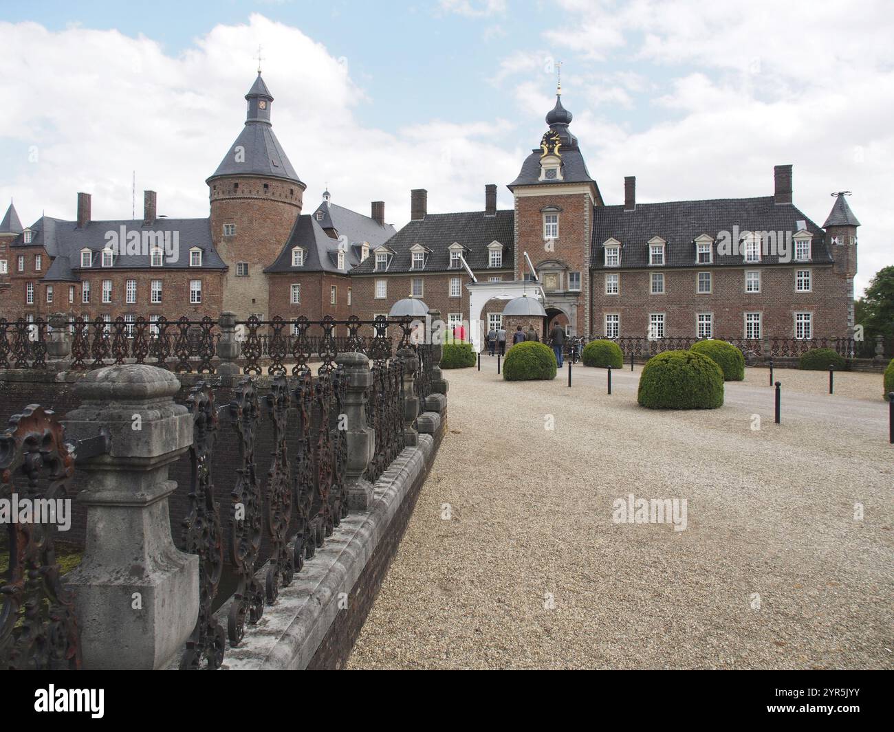 Historic castle with symmetrical courtyard, details in the brickwork ...