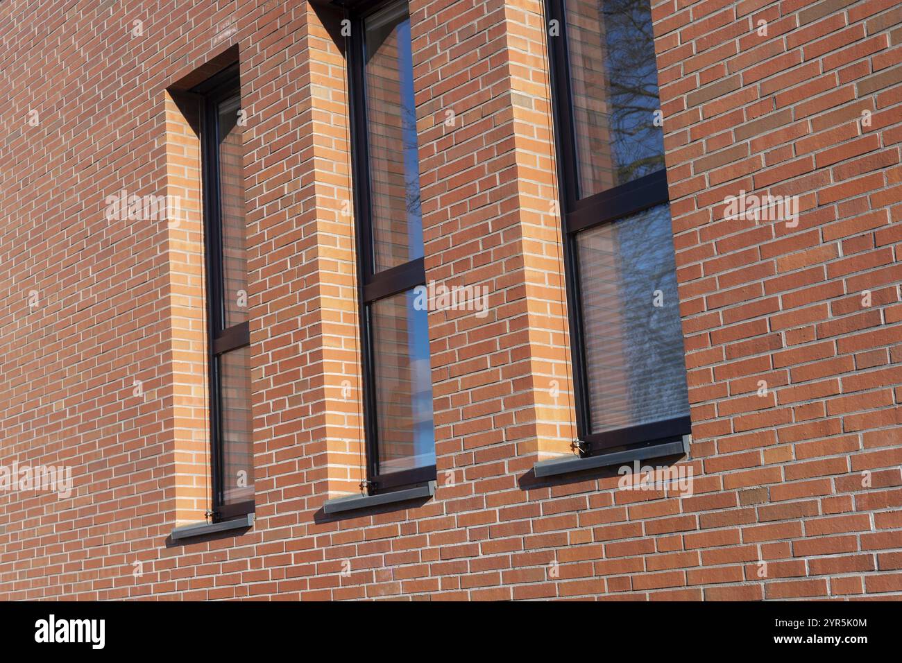 Facade of an modern large house, wall with windows Stock Photo - Alamy
