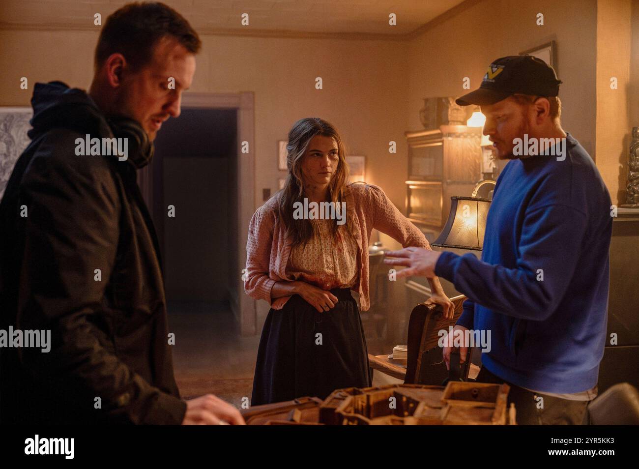 HERETIC, from left: director Scott Beck, Chloe East, diector Bryan Woods, on set, 2024. ph ...