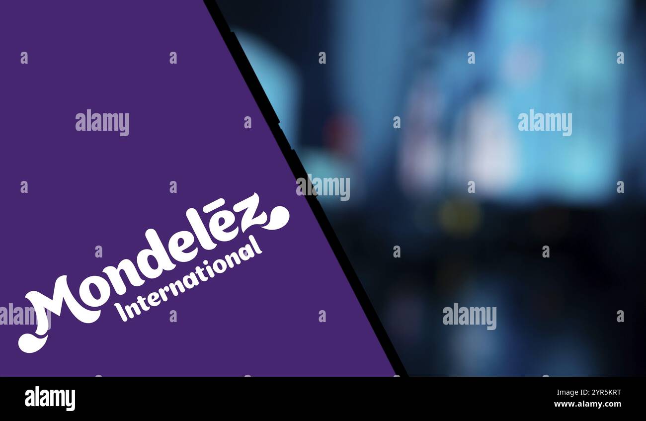 Mondelez international logo is displayed on smartphone. MondelEz ...