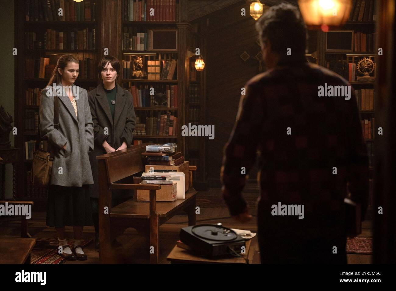 HERETIC, from left: Chloe East, Sophie Thatcher, Hugh Grant, 2024. ph ...