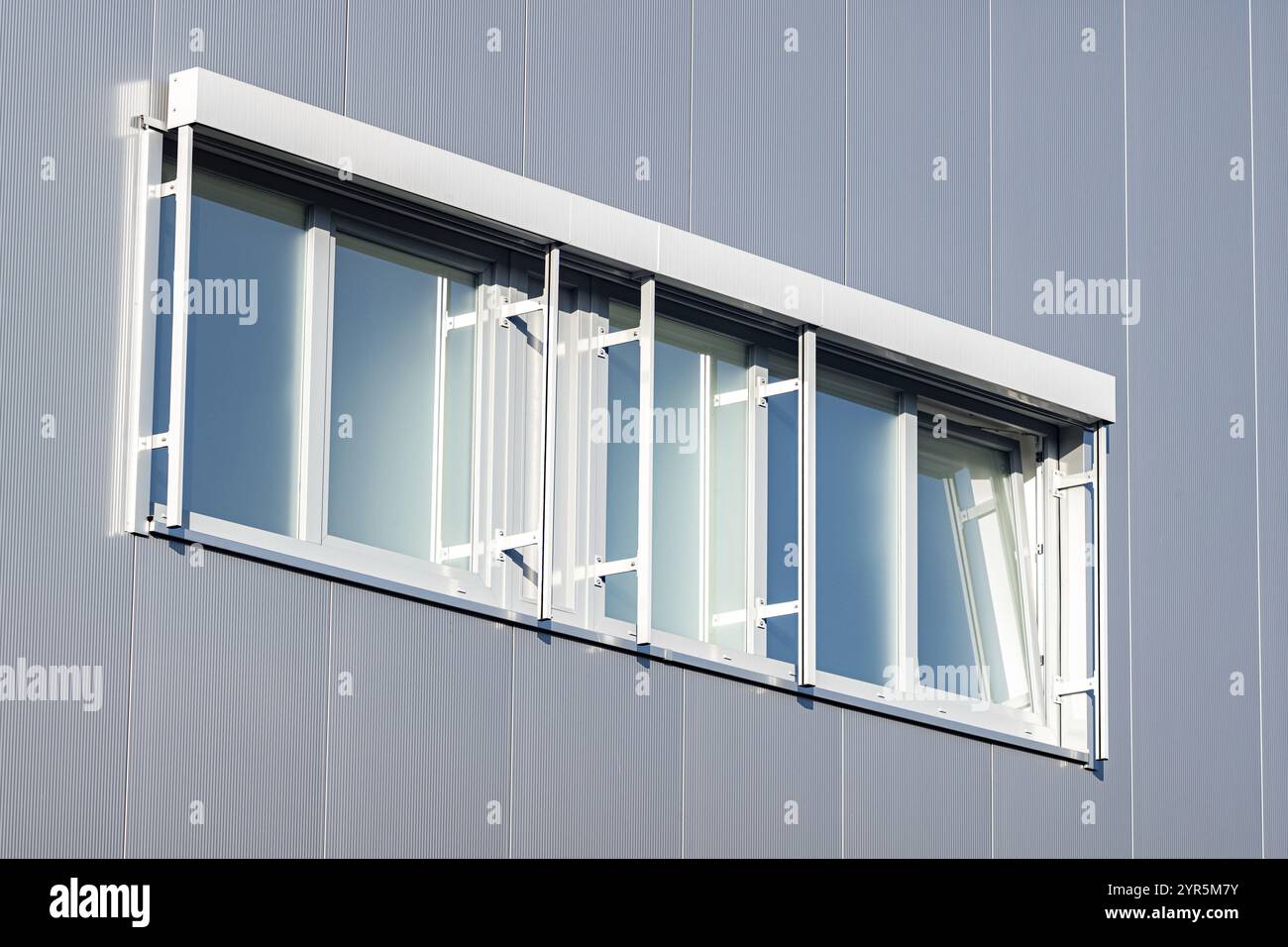Facade of an modern large house, wall with windows Stock Photo - Alamy