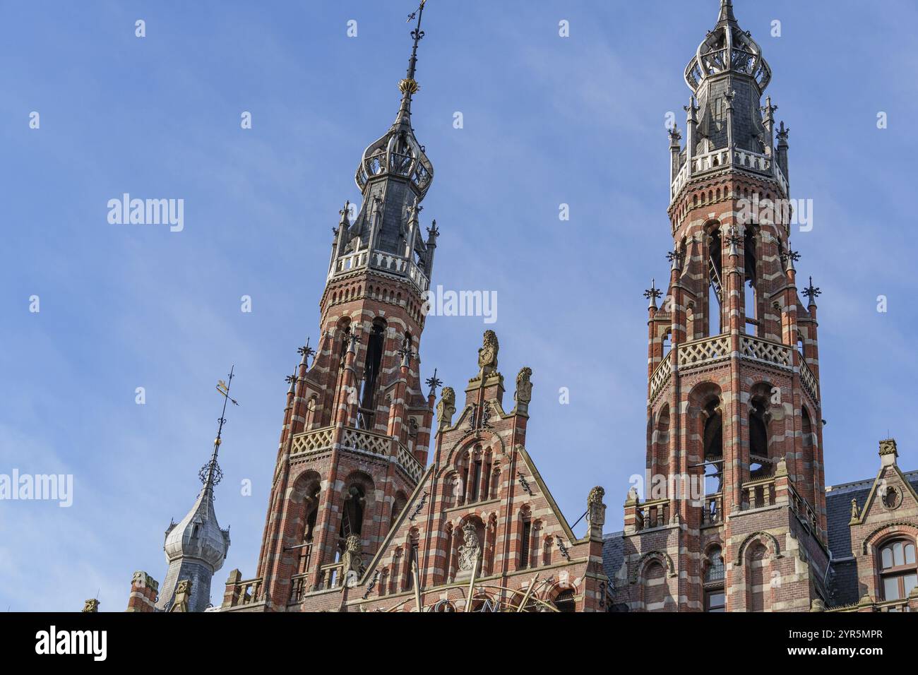 Magnificent Gothic church towers rise into the clear sky, Amsterdam, Netherlands Stock Photo - Alamy