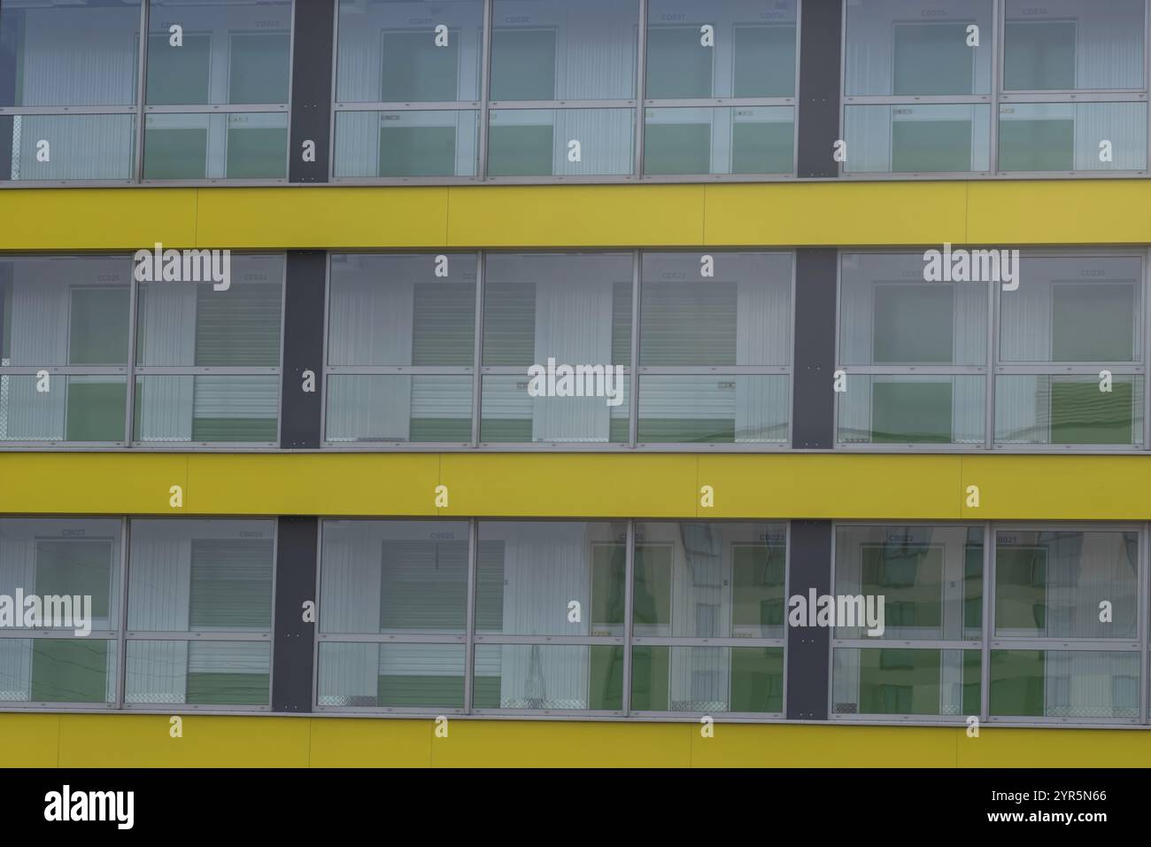Facade of an modern large house, wall with windows Stock Photo - Alamy