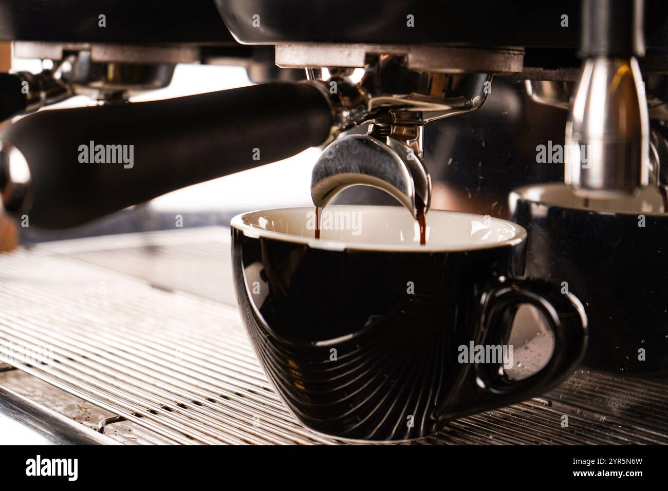 Professional man making pouring stream hi-res stock photography and ...