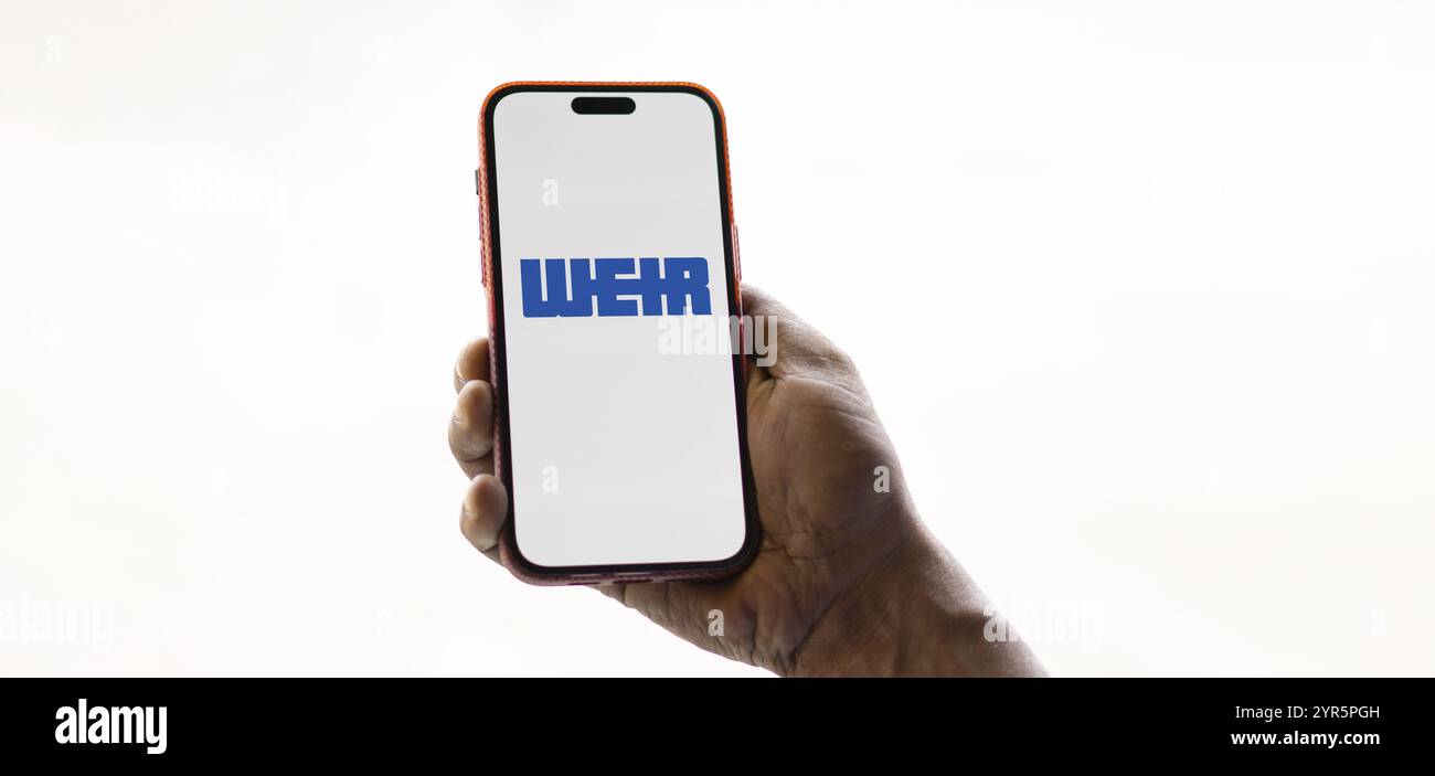 Weir logo is displayed on smartphone. Weir Group plc is a Scottish ...