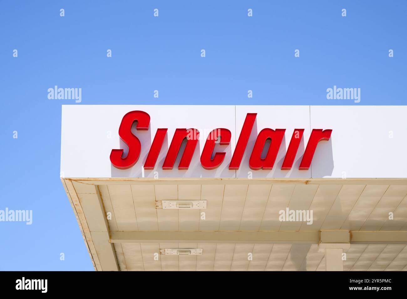 Hanksville, UT, USA - June 18, 2024; Brand name in red on Sinclair gas ...