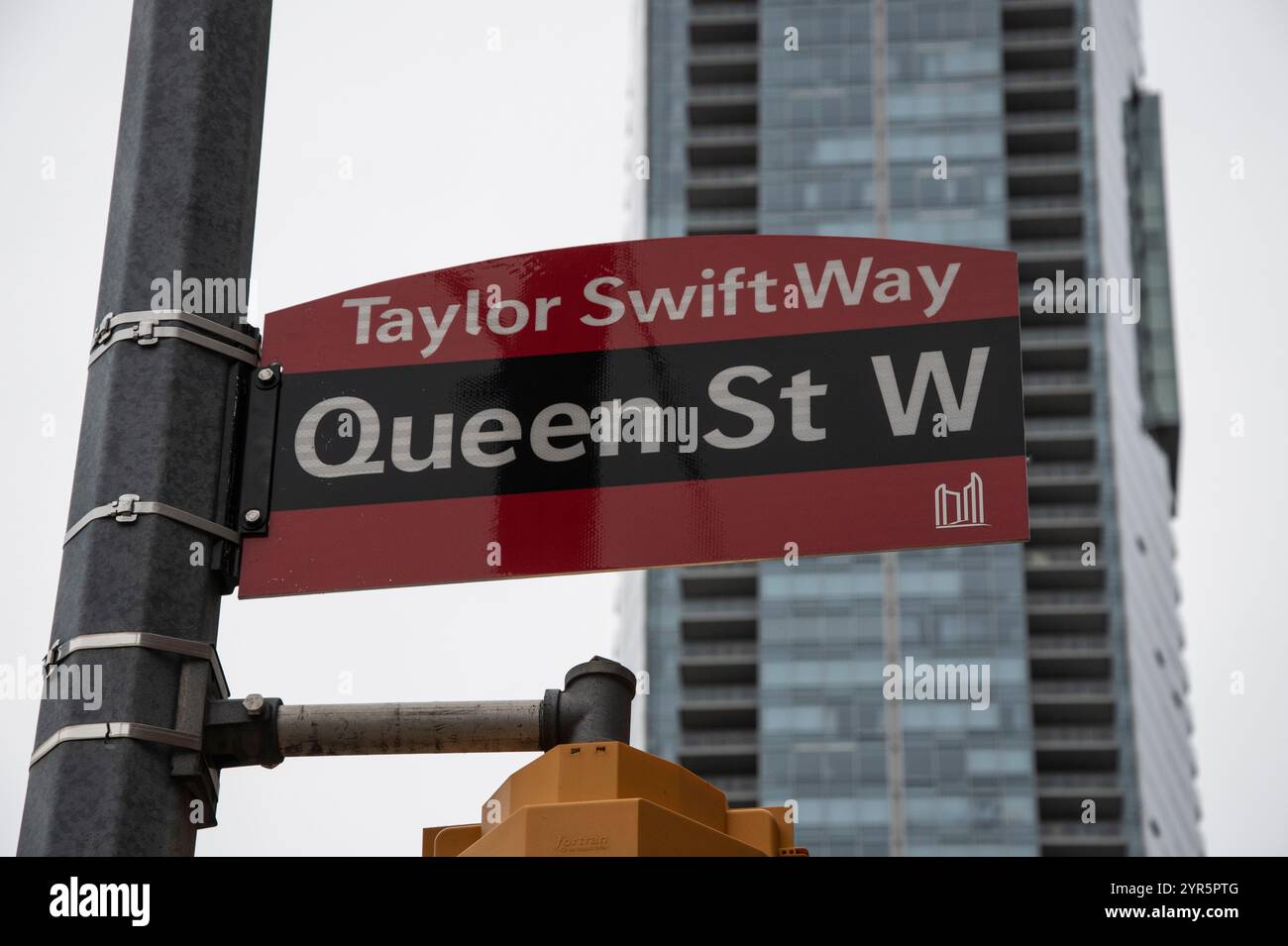 Signs on street light pole hi-res stock photography and images - Alamy