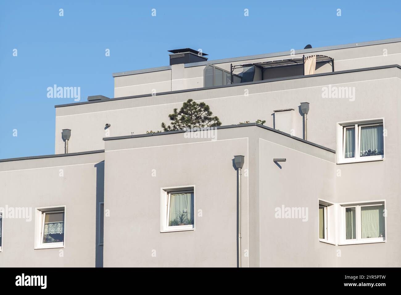 Facade of an modern large house, wall with windows Stock Photo - Alamy