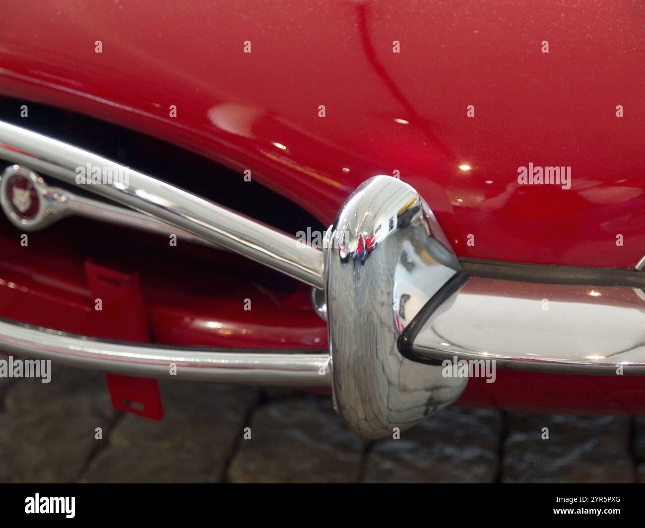 Red vintage car with chrome-plated bumper and retro accents in vehicle ...