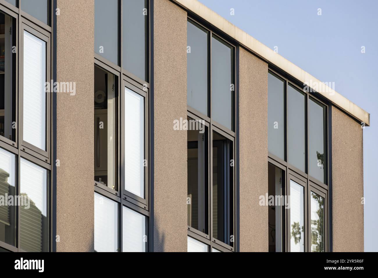 Facade of an modern large house, wall with windows Stock Photo - Alamy