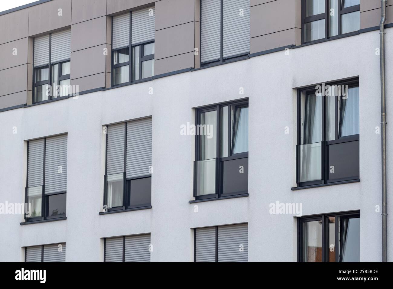 Facade of an modern large house, wall with windows Stock Photo - Alamy