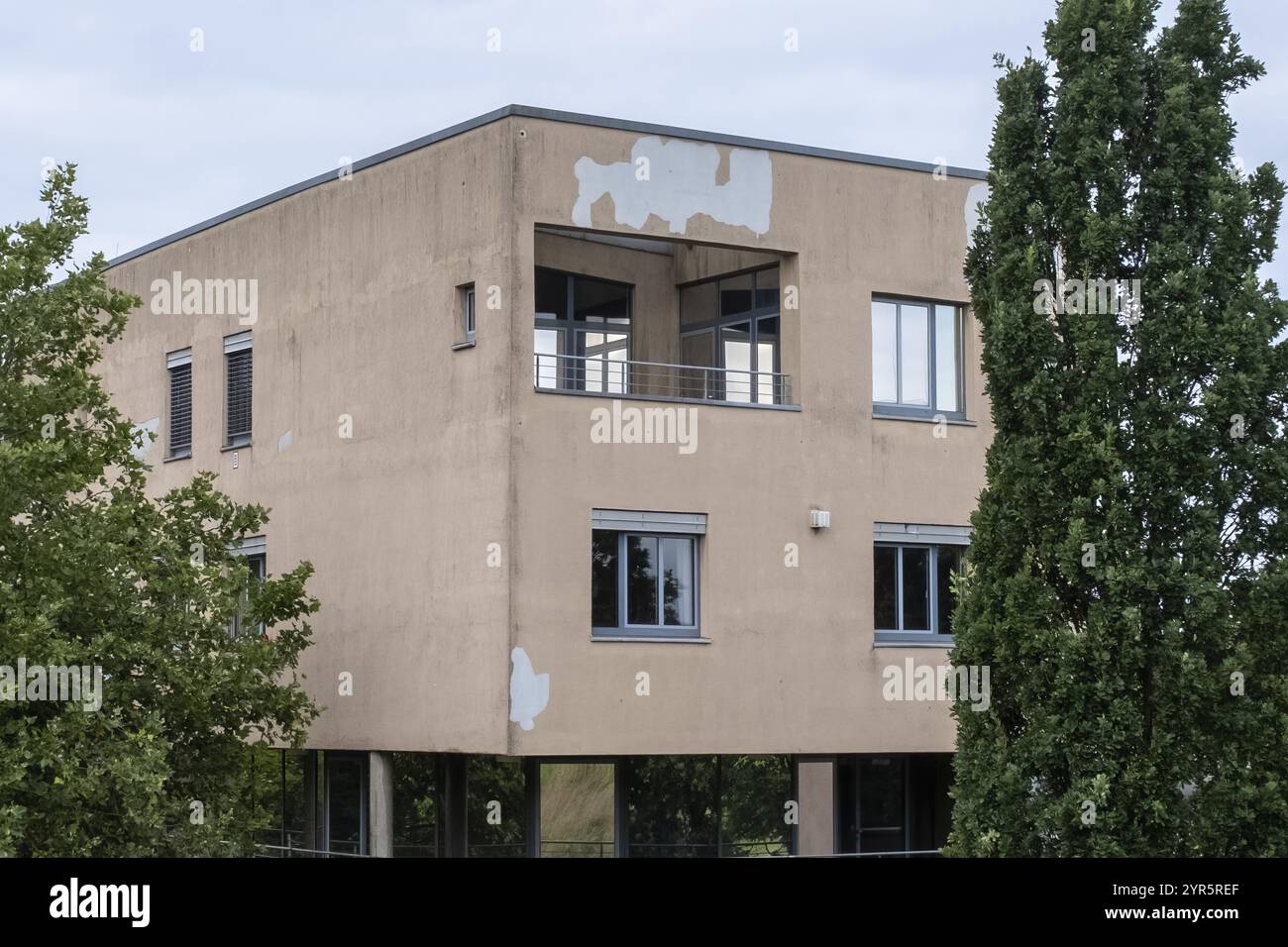 Old concrete building with some windows Stock Photo - Alamy