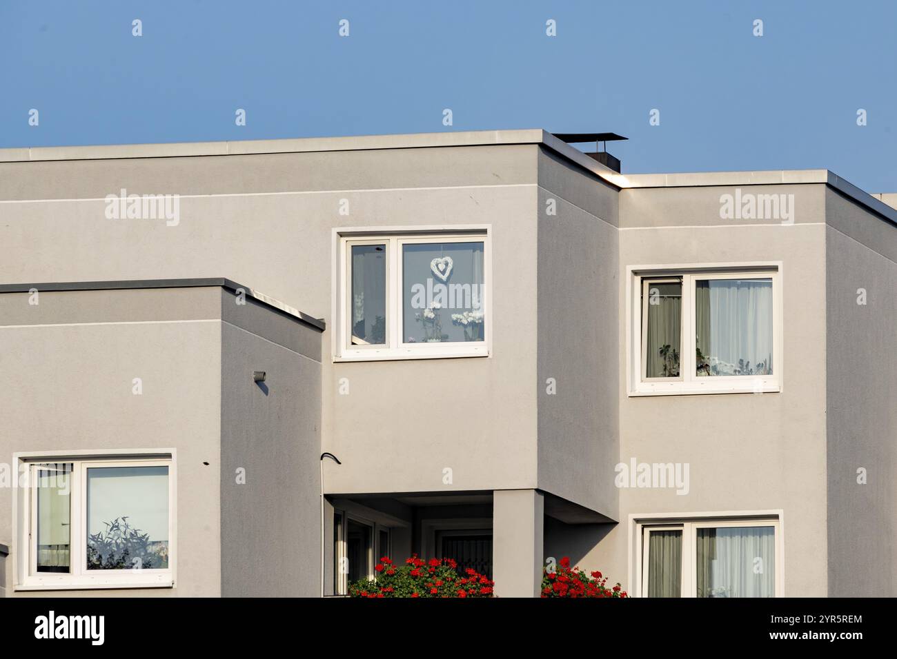 Facade of an modern large house, wall with windows Stock Photo - Alamy