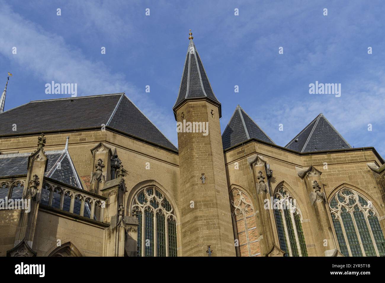 Church with Gothic architecture and striking spires under a clear sky ...