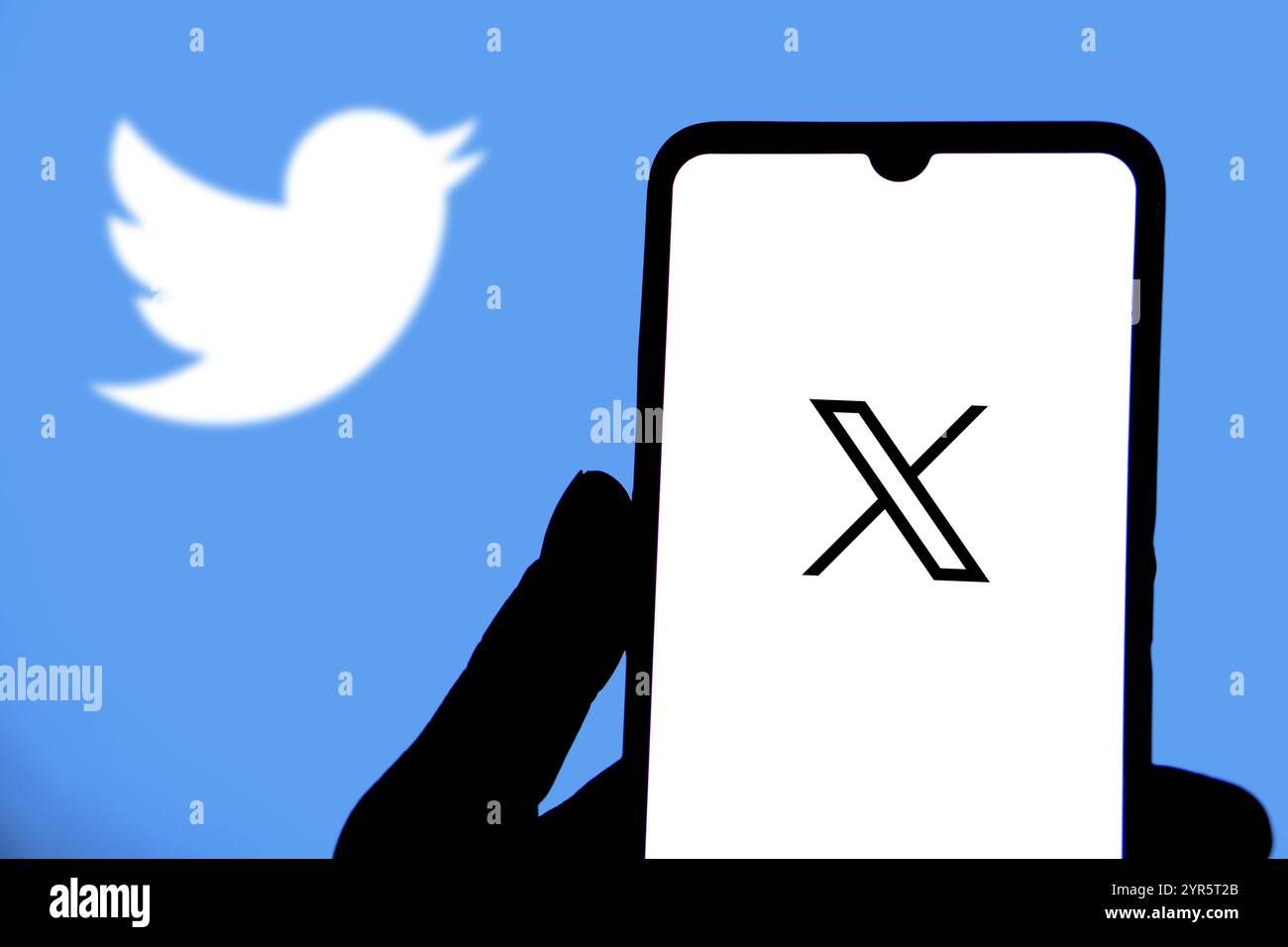 X twitter new logo on phone screen stock image Stock Photo - Alamy