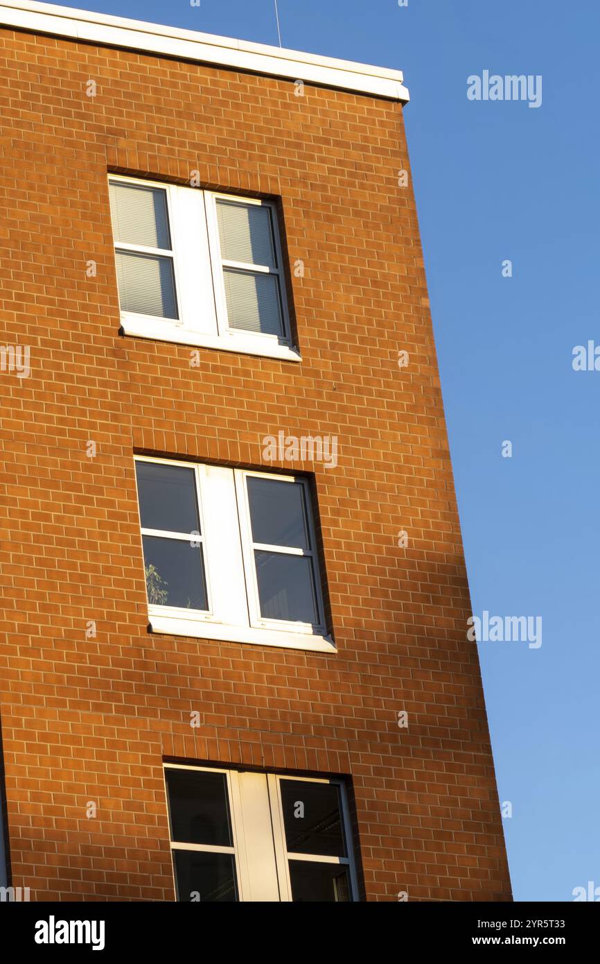 Facade of an modern large house, wall with windows Stock Photo - Alamy