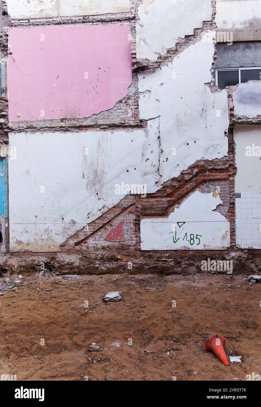 demolition background, side walls of a residential building with traces ...