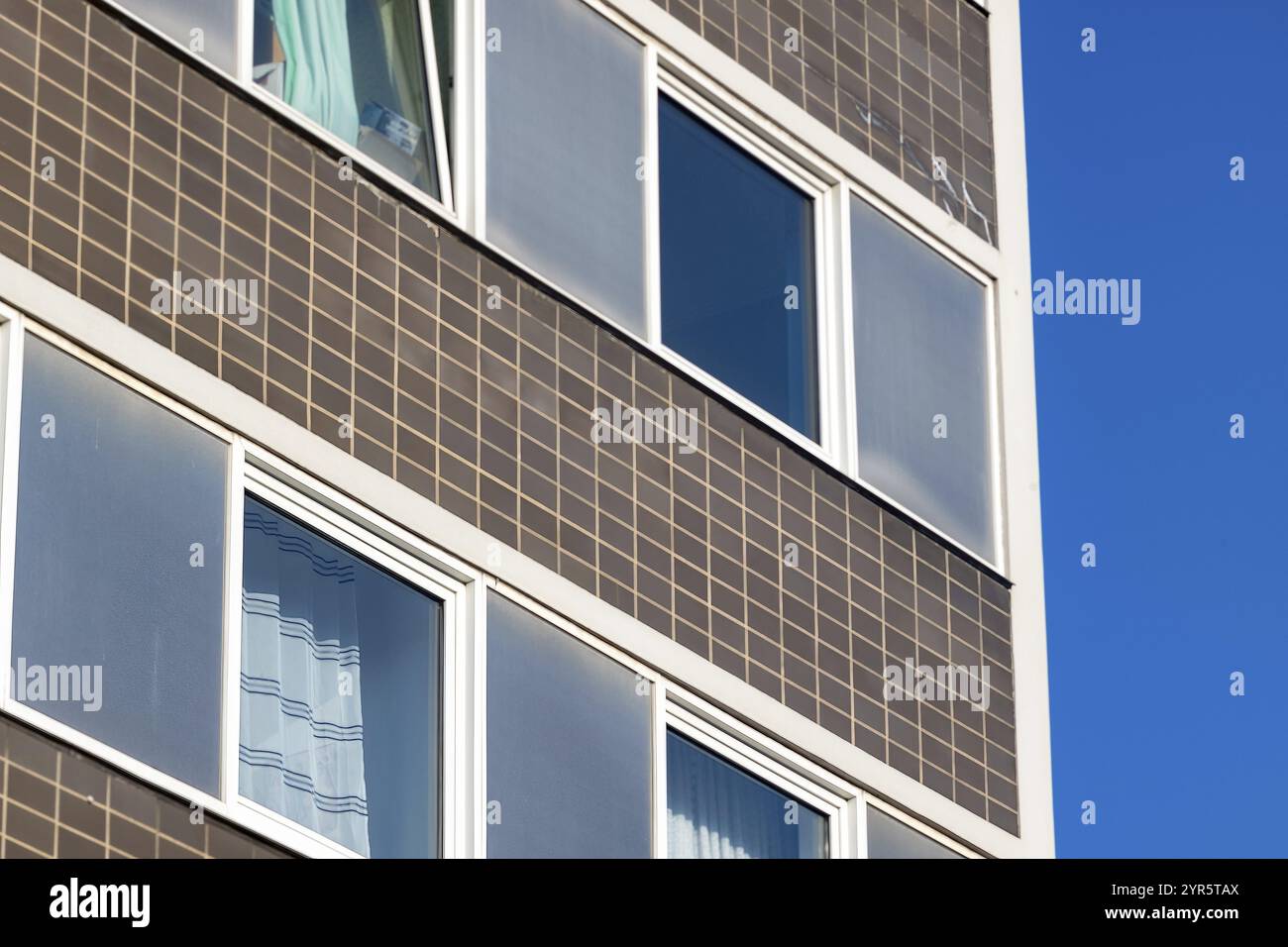 Facade of an modern large house, wall with windows Stock Photo - Alamy