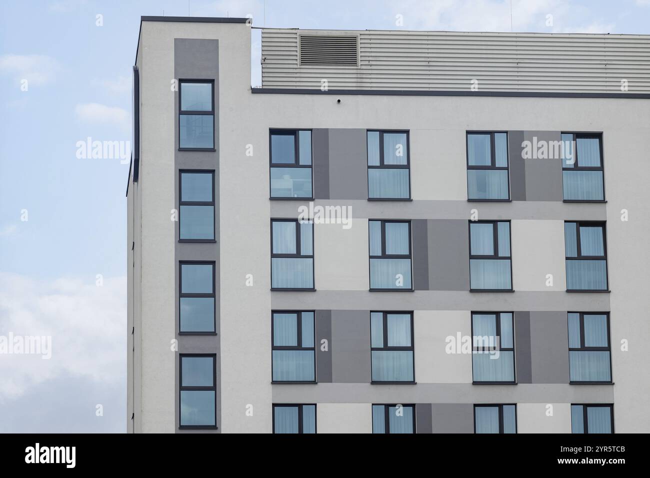 Facade of an modern large house, wall with windows Stock Photo - Alamy