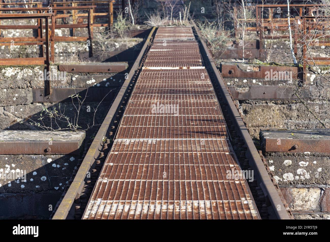 Rusted metal walkway in an industrial setting with grid pattern Stock ...
