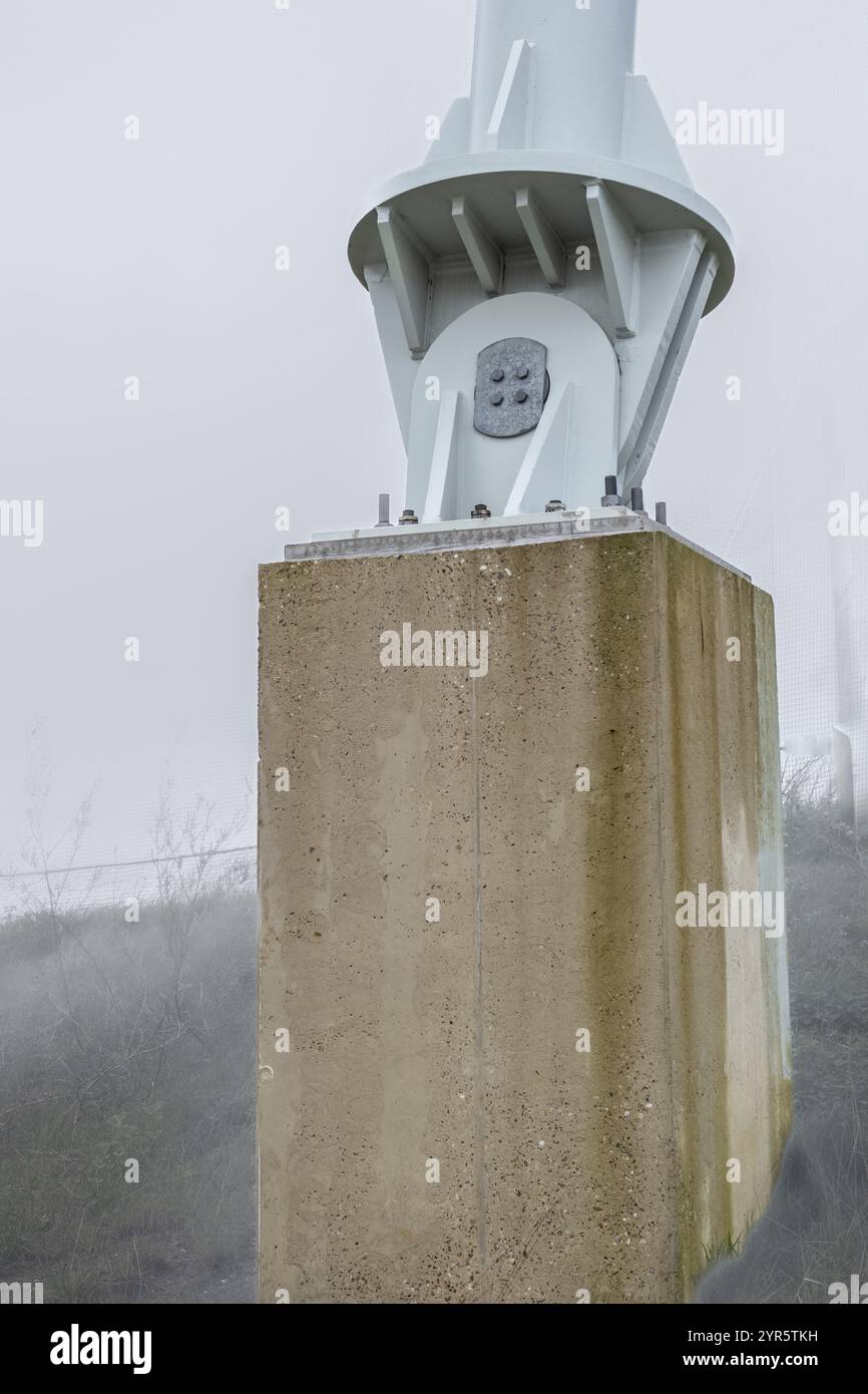 Rope tensioned in concrete Stock Photo - Alamy