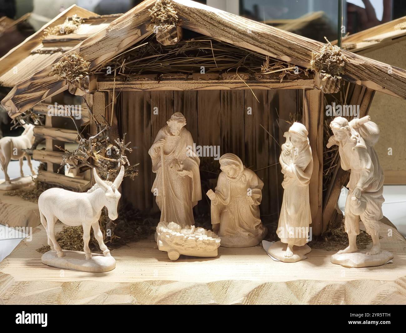 A wooden Christmas Nativity scene illuminated at night Stock Photo - Alamy