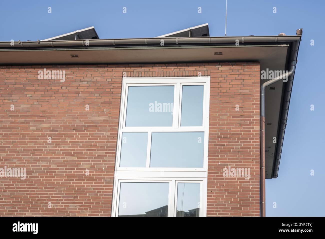 Facade of an modern large house, wall with windows Stock Photo - Alamy