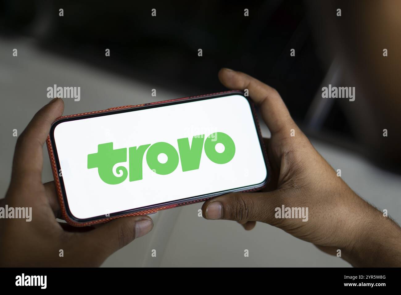 Trovo logo is displayed on smartphone. Trovo is a video game live ...