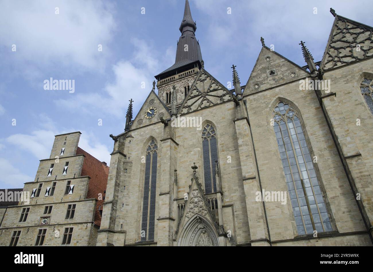 Impressive Gothic church with high windows and a striking tower ...