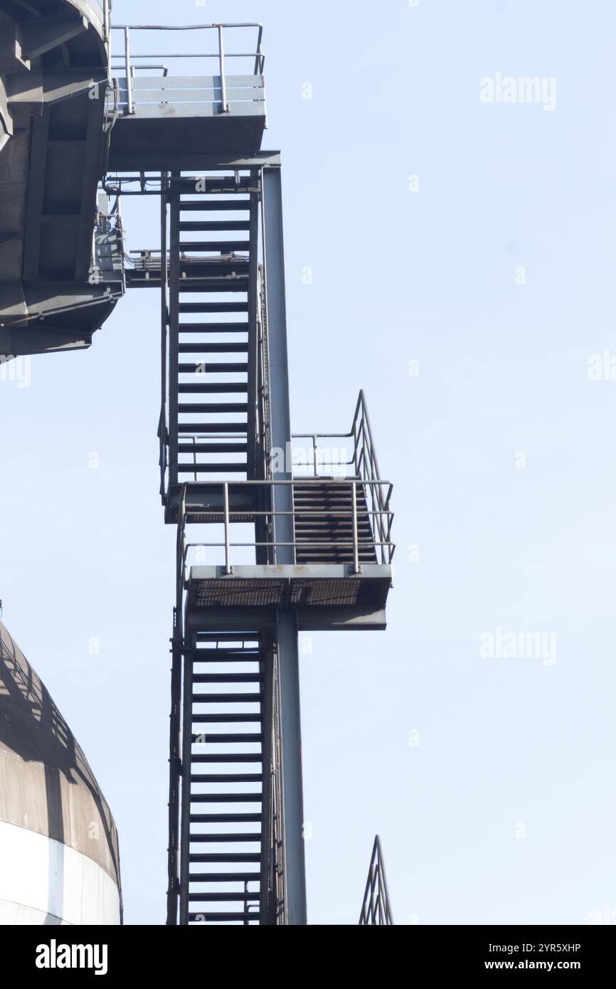 Tall, vertical metal staircase as part of an industrial structure Stock ...