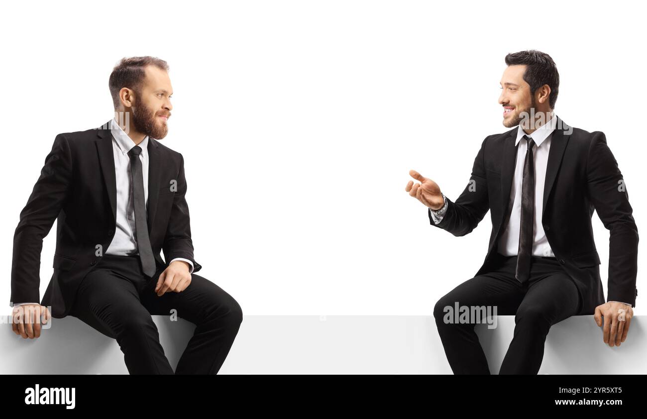 Businessmen sitting on a panel and having a conversation isolated on ...