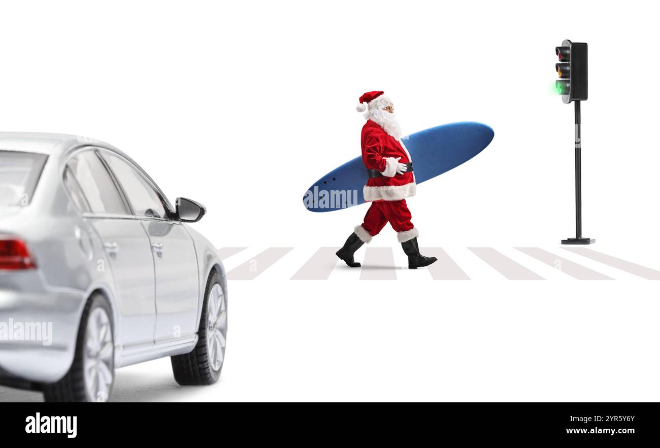 Santa claus crossing a street and carrying a surfboard isolated on ...