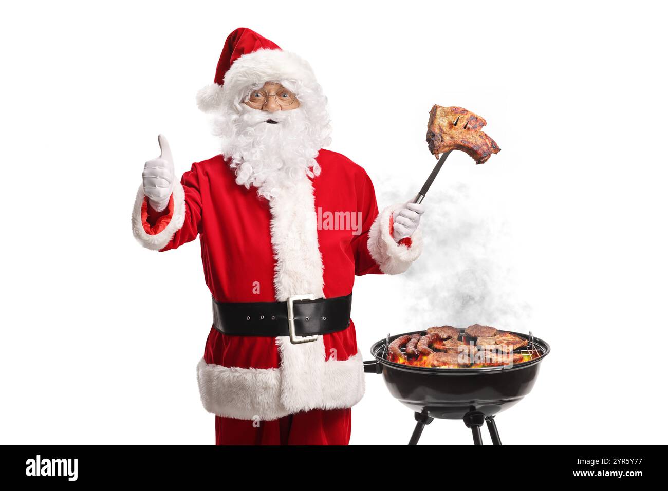 Santa claus holding a meat steak and gesturing thumbs up isolated on ...