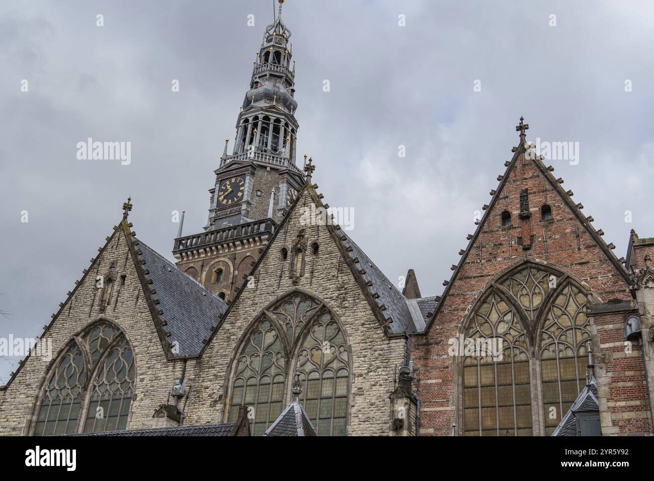 Magnificent Gothic church with imposing tower and ornate windows under ...