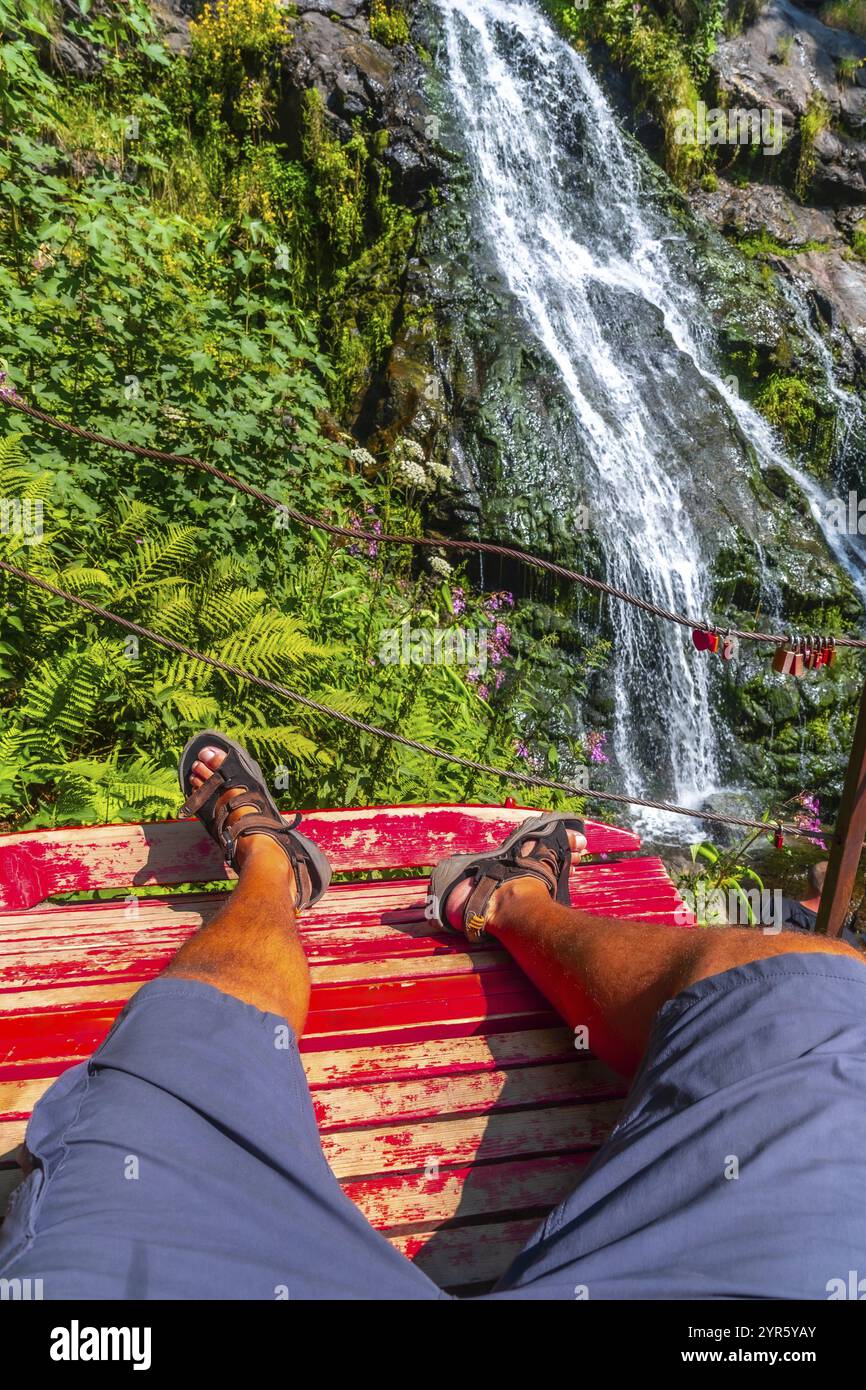 Man under waterfall hi-res stock photography and images - Alamy
