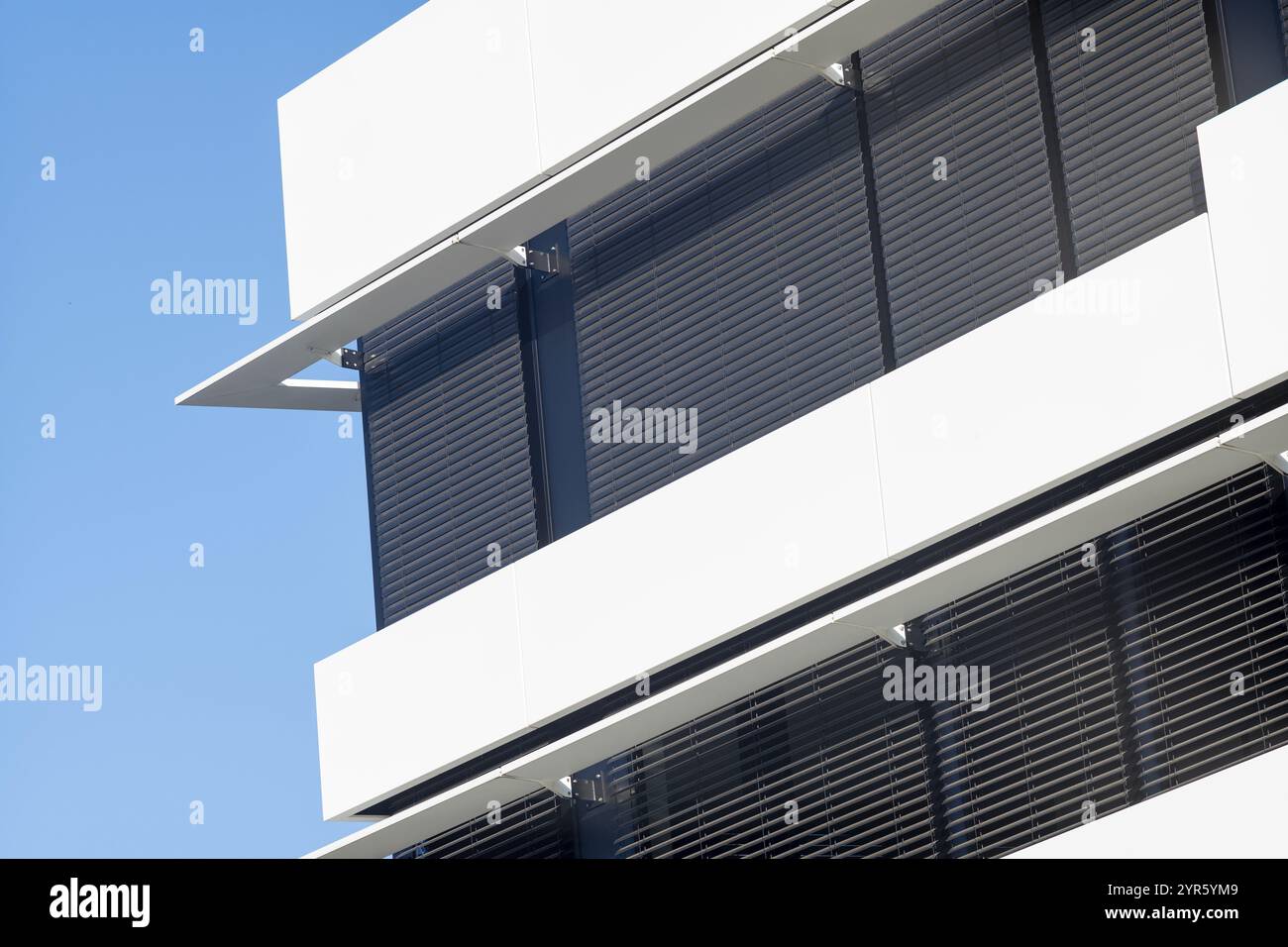 Facade of an modern large house, wall with windows Stock Photo - Alamy