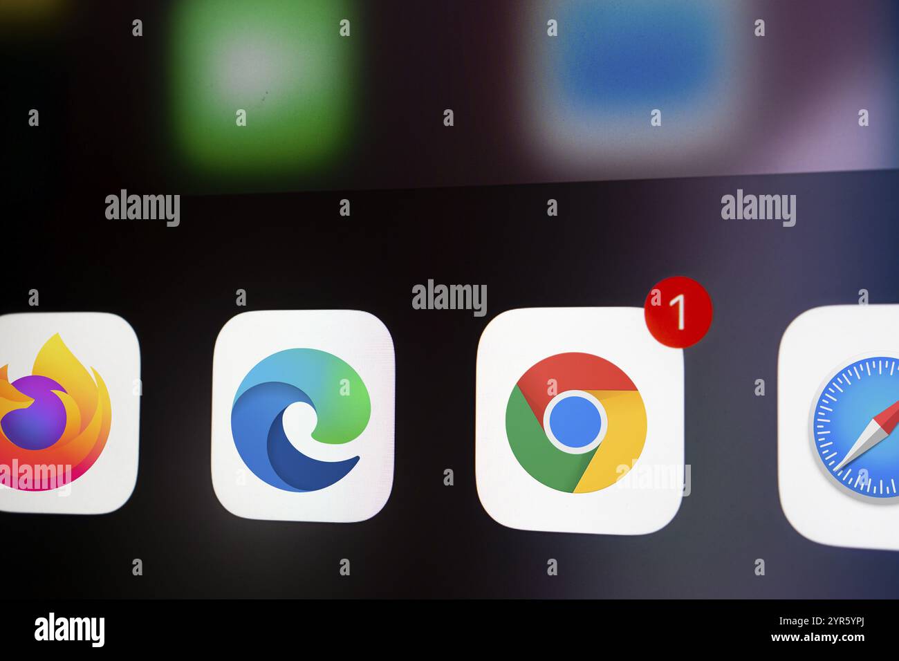A close up of an iPhone screen displaying the Google Chrome, mozilla firefox, microsoft edge ...