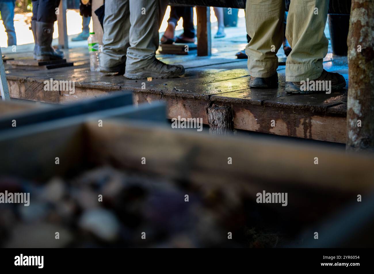 Defense POW/MIA Accounting Agency (DPAA) recovery team members screen ...